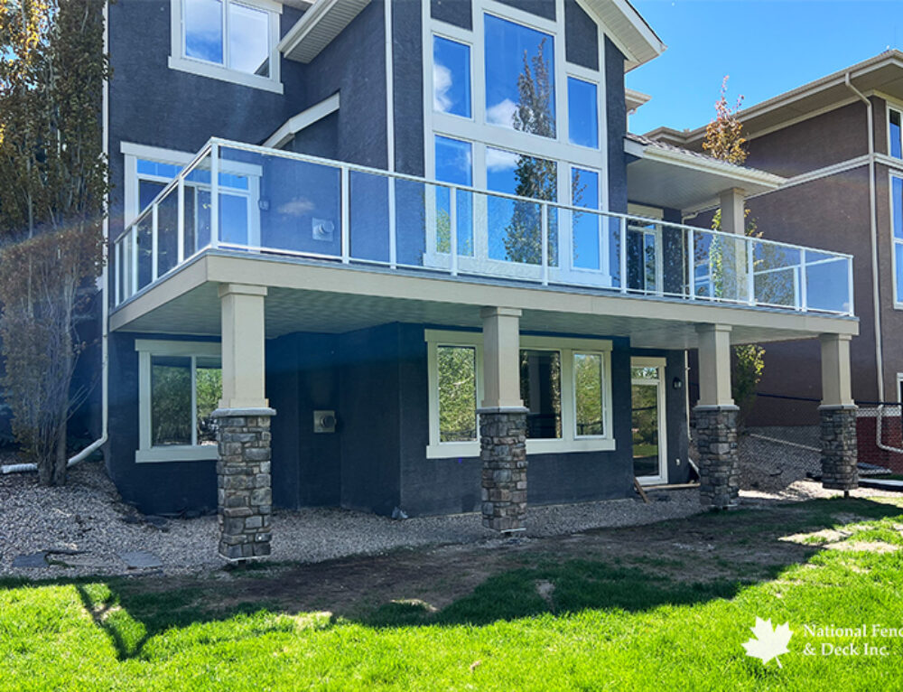 Walk out deck with water proof vinyl surface - National Fence & Deck ...